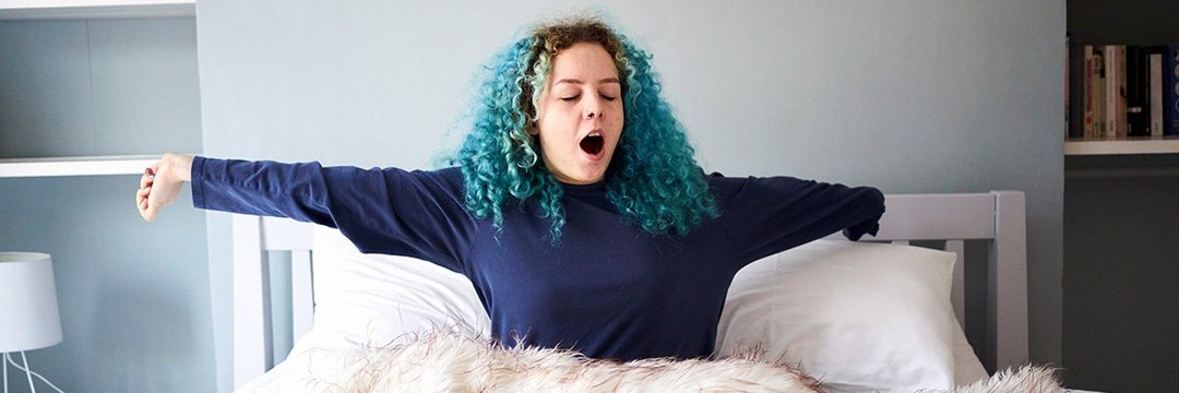 What time do Britons get up in the morning?